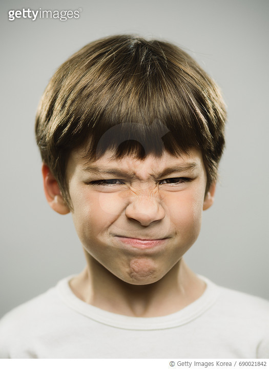 690021842 | 게티이미지코리아 | Real boy showing disgusted expression Royalty ...